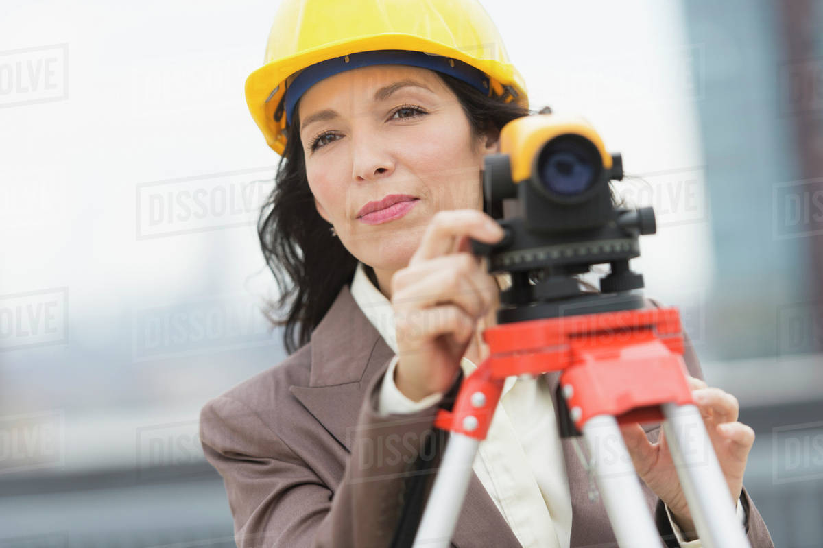 Architect using theodolite - Royalty-free Stock Photo | Dissolve