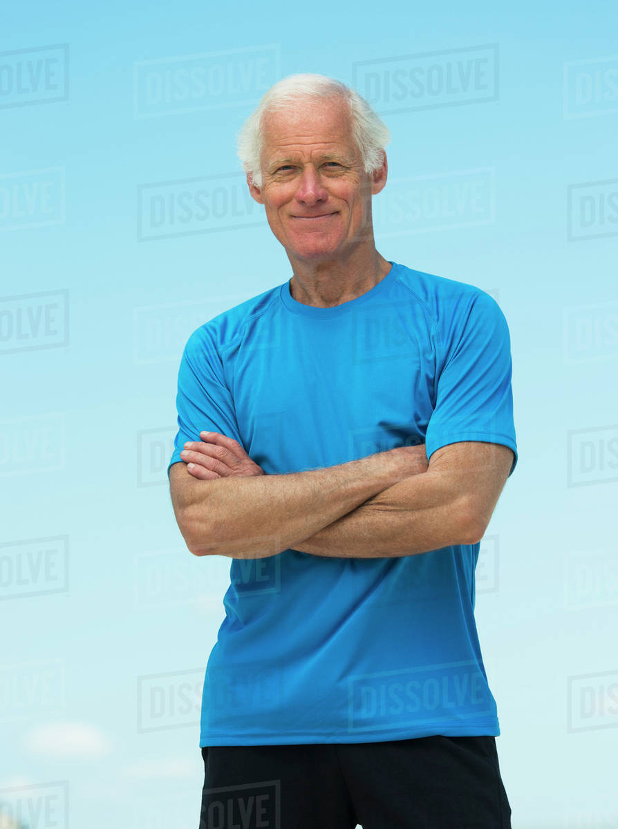 Portrait of senior man standing outdoors - Royalty-free Stock Photo ...