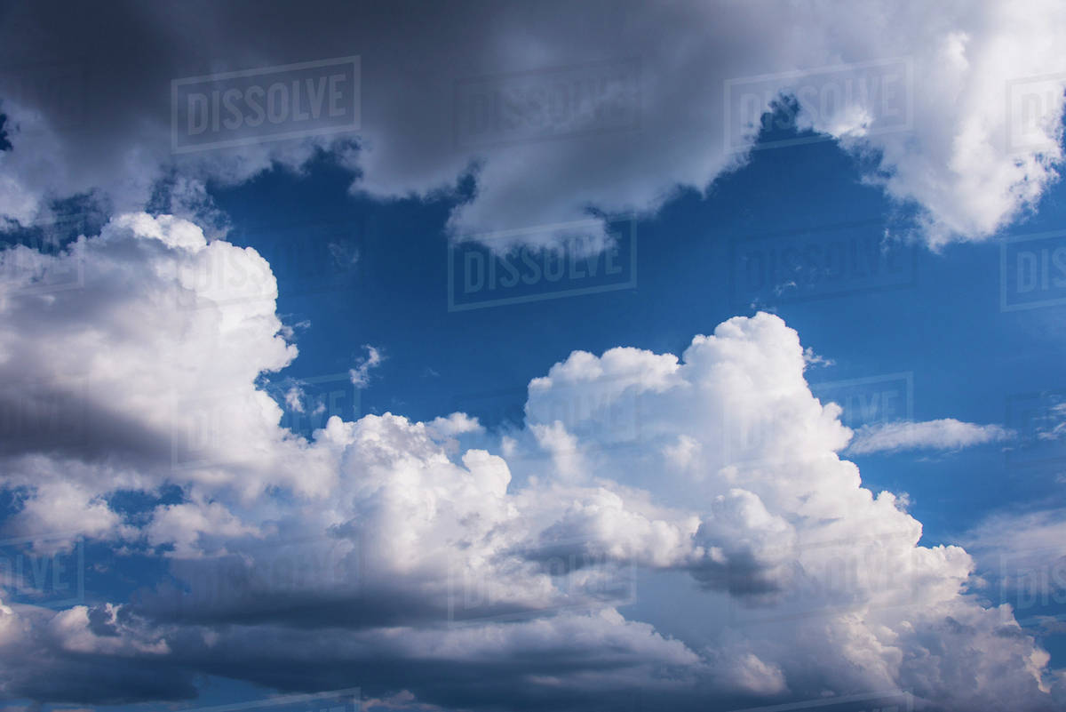 Puffy clouds on sky - Royalty-free Stock Photo | Dissolve