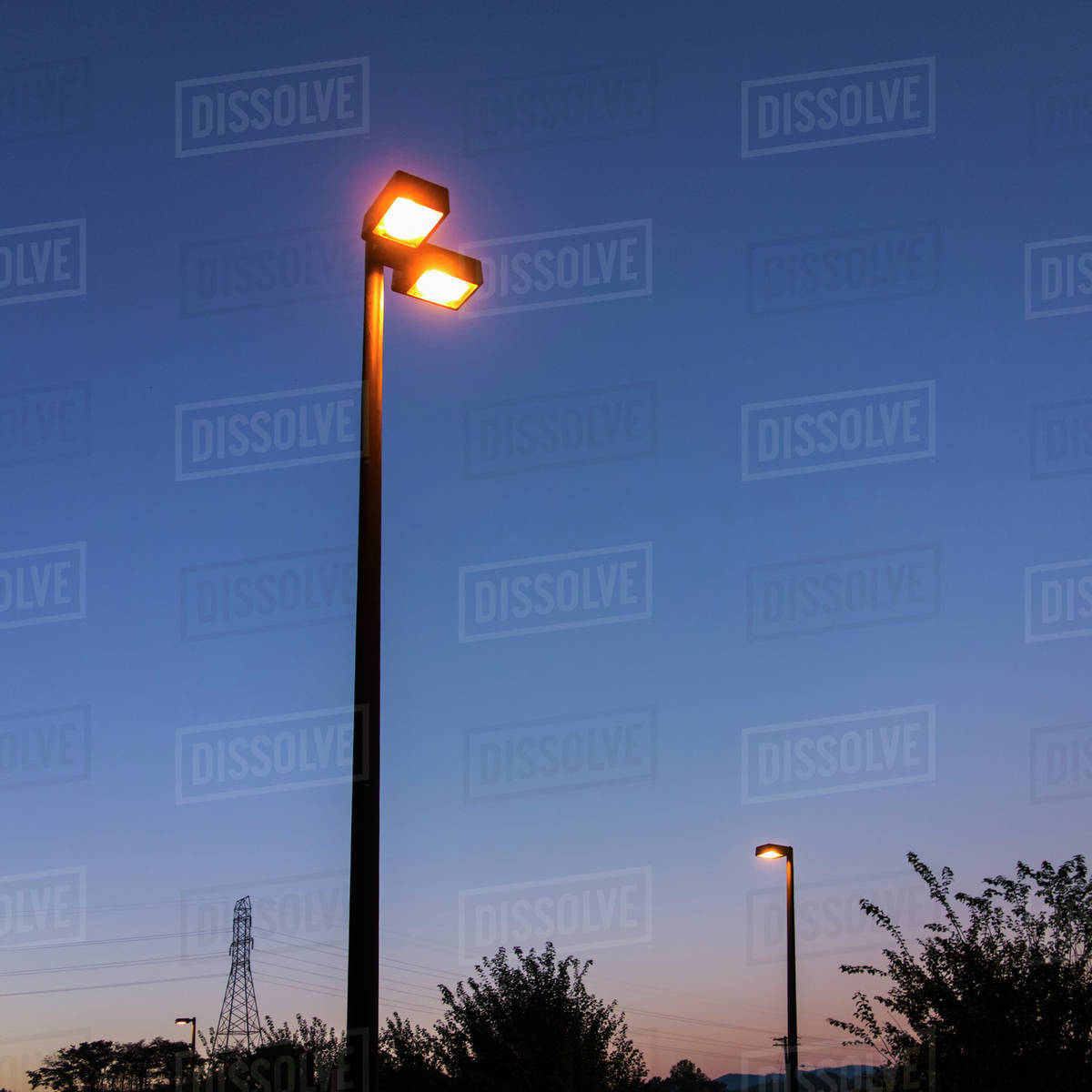 Street light at dusk - Royalty-free Stock Photo | Dissolve
