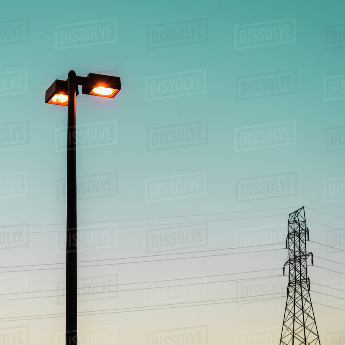 Street light and electricity pylon - Royalty-free Stock Photo | Dissolve