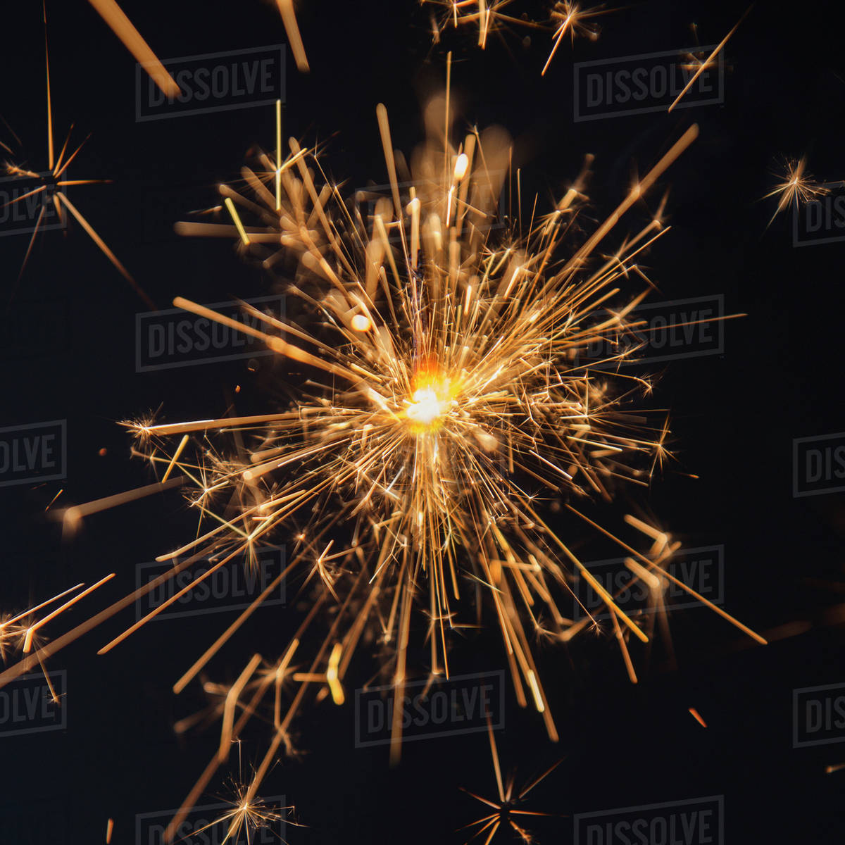 Studio shot of sparkler - Royalty-free Stock Photo | Dissolve