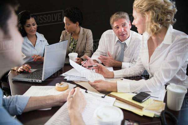Office workers during discussion - Stock Photo - Dissolve