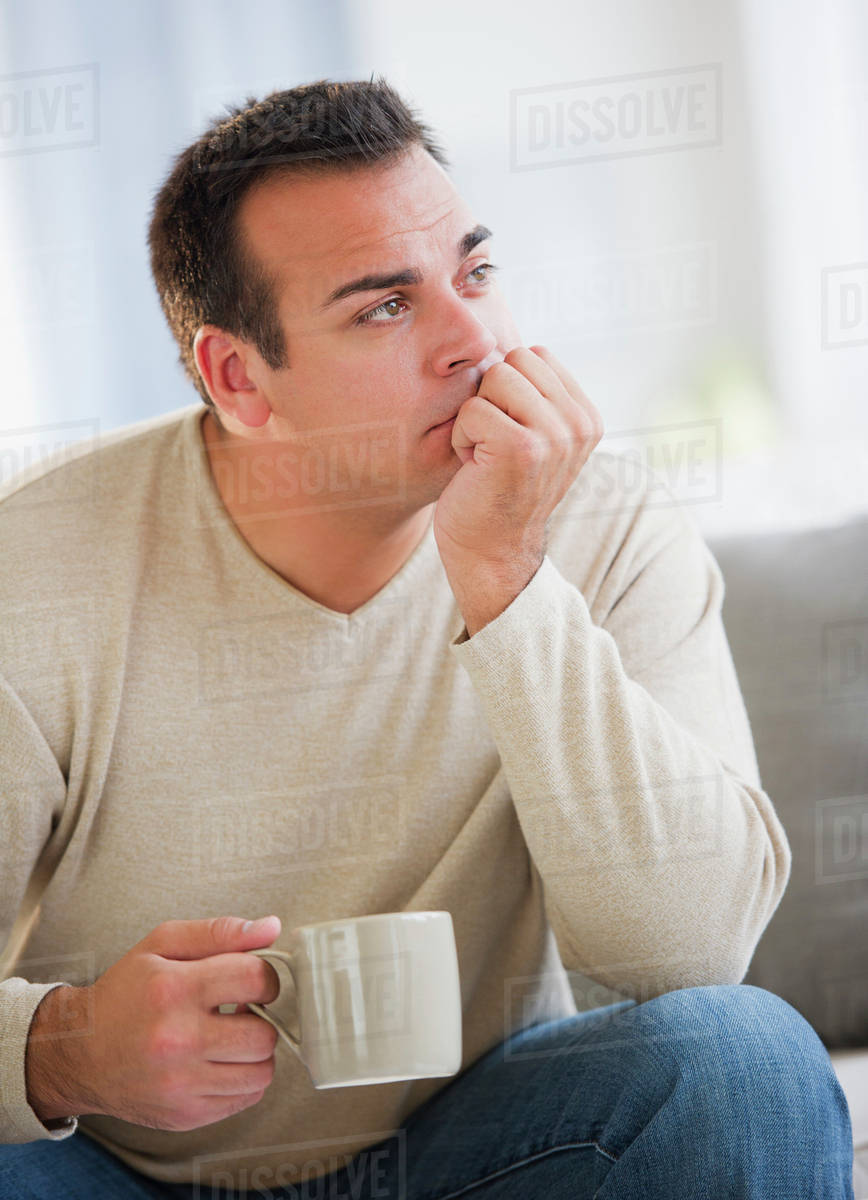 Portrait of man contemplating - Royalty-free Stock Photo | Dissolve