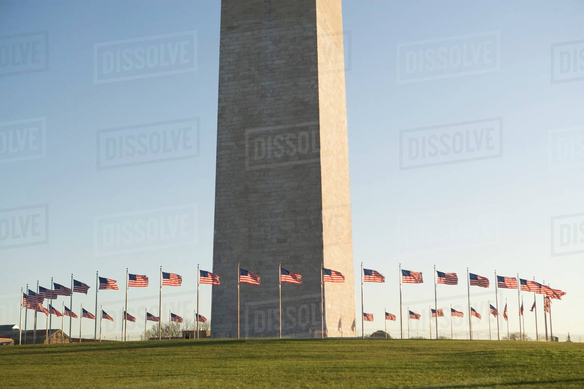 USA, Washington DC, washington monument surrounded by flags - Royalty ...