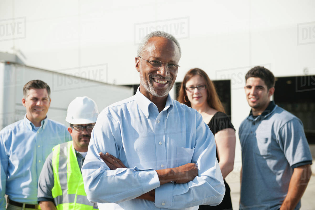 Portrait of warehouse workers and manager - Royalty-free Stock Photo ...