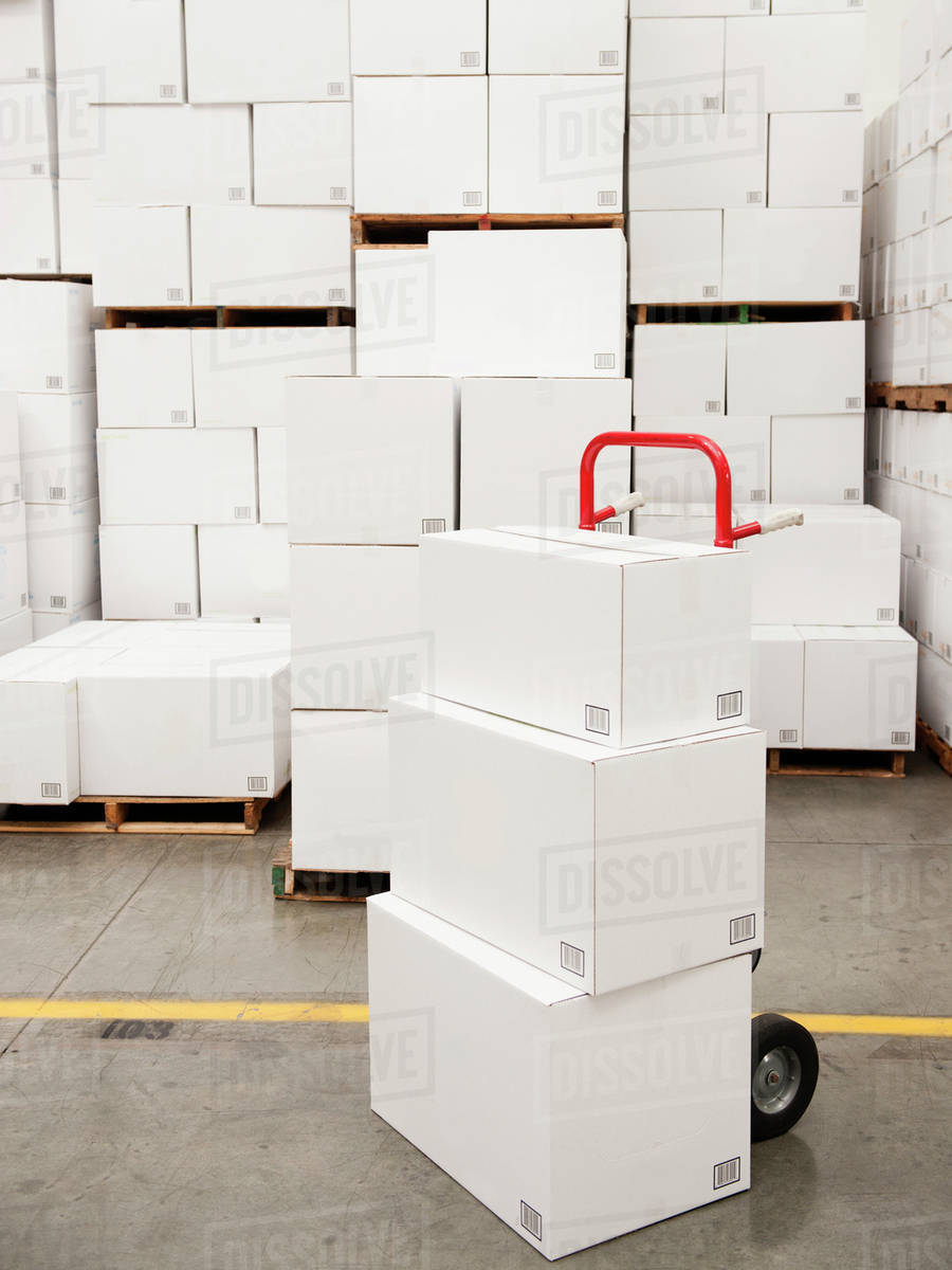 Stack of boxes in warehouse - Royalty-free Stock Photo | Dissolve