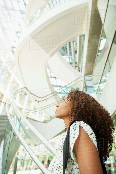 Profile of woman looking up - Royalty-free Stock Photo | Dissolve