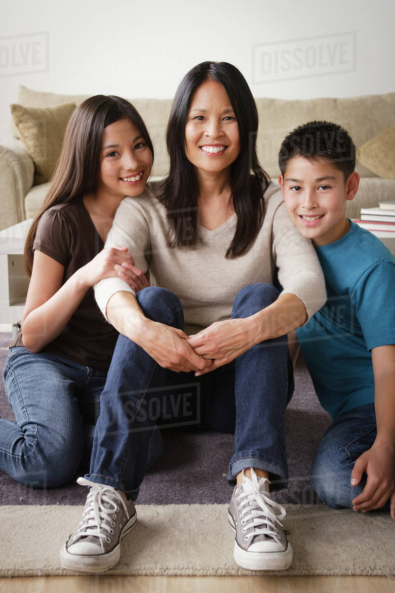 Portrait of cheerful family - Royalty-free Stock Photo | Dissolve