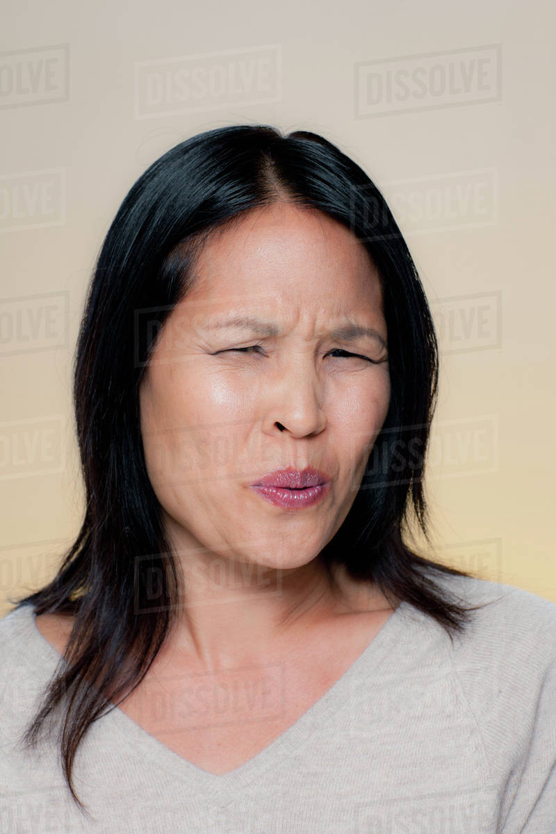 Portrait of woman with disgusted expression - Royalty-free Stock Photo ...
