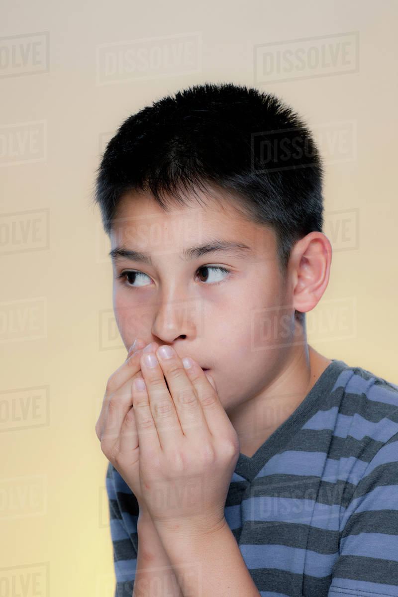 Portrait of scared boy - Royalty-free Stock Photo | Dissolve