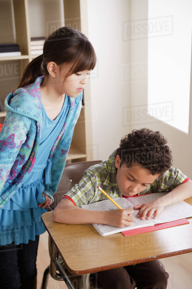 Two children (8-9) at school - Royalty-free Stock Photo | Dissolve