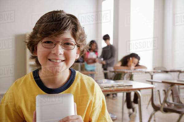 Portrait of schoolboy (10-11) - Royalty-free Stock Photo | Dissolve