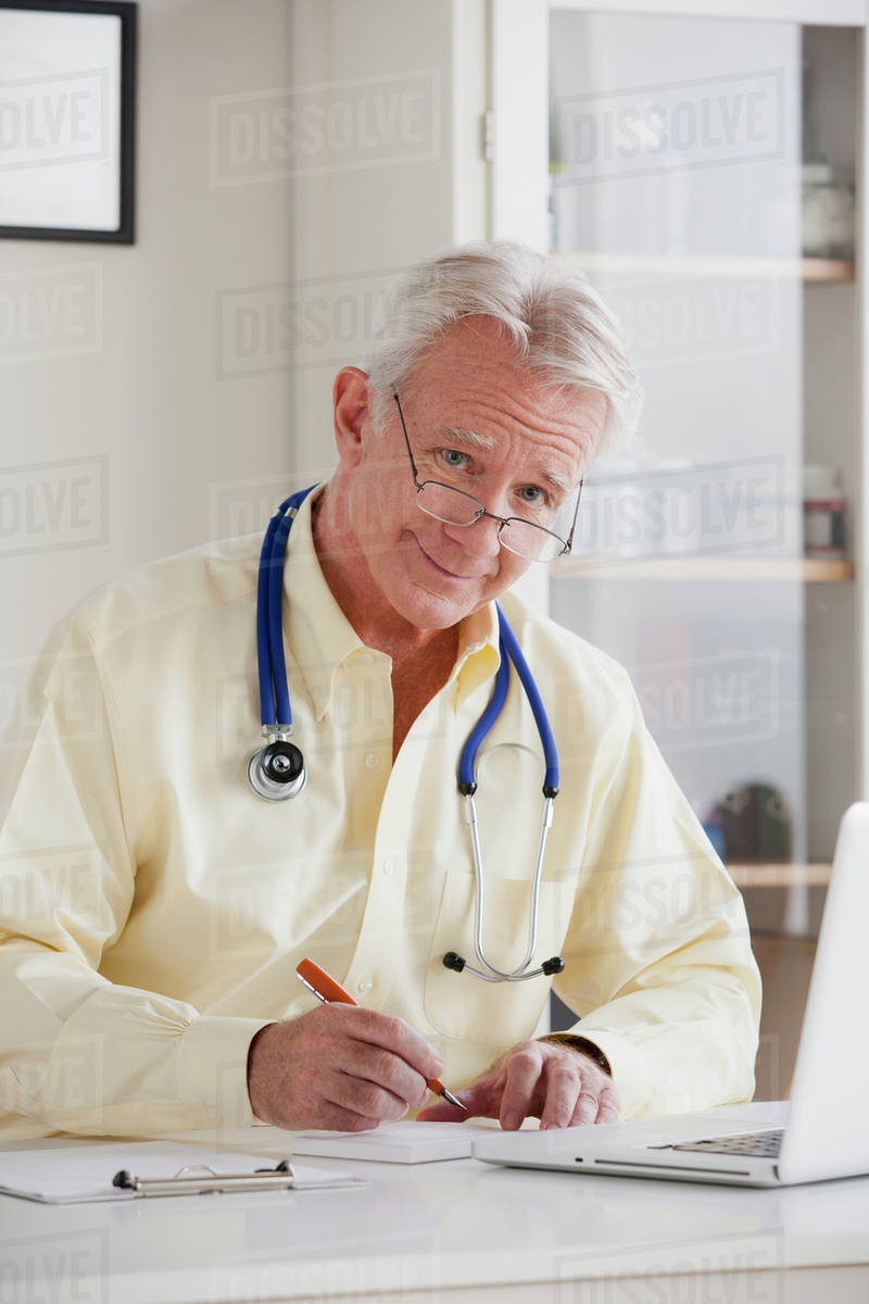 Portrait of senior doctor - Royalty-free Stock Photo | Dissolve