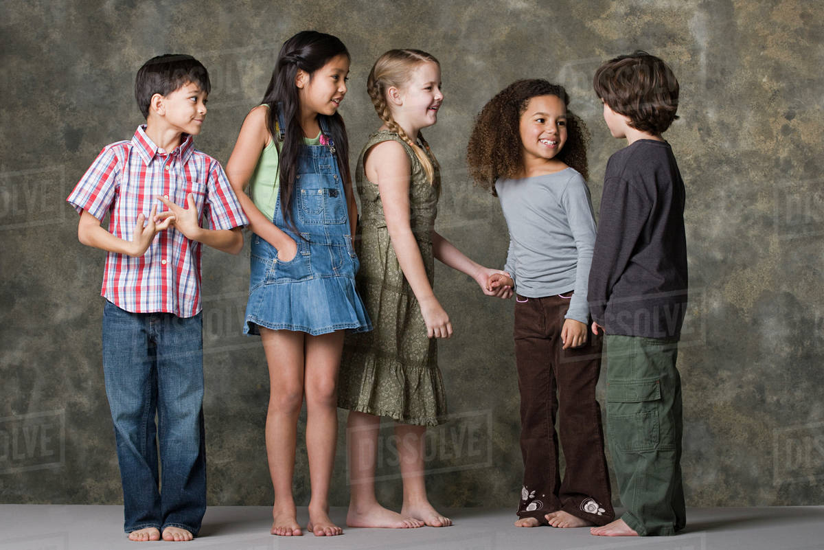 Children (6-7, 8-9) playing together, studio shot - Royalty-free Stock ...