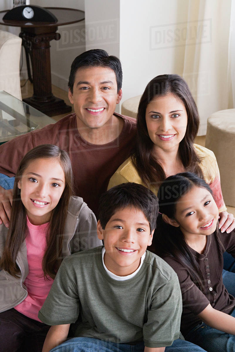 Portrait of happy family with three children (8-9, 10-11) - Royalty ...