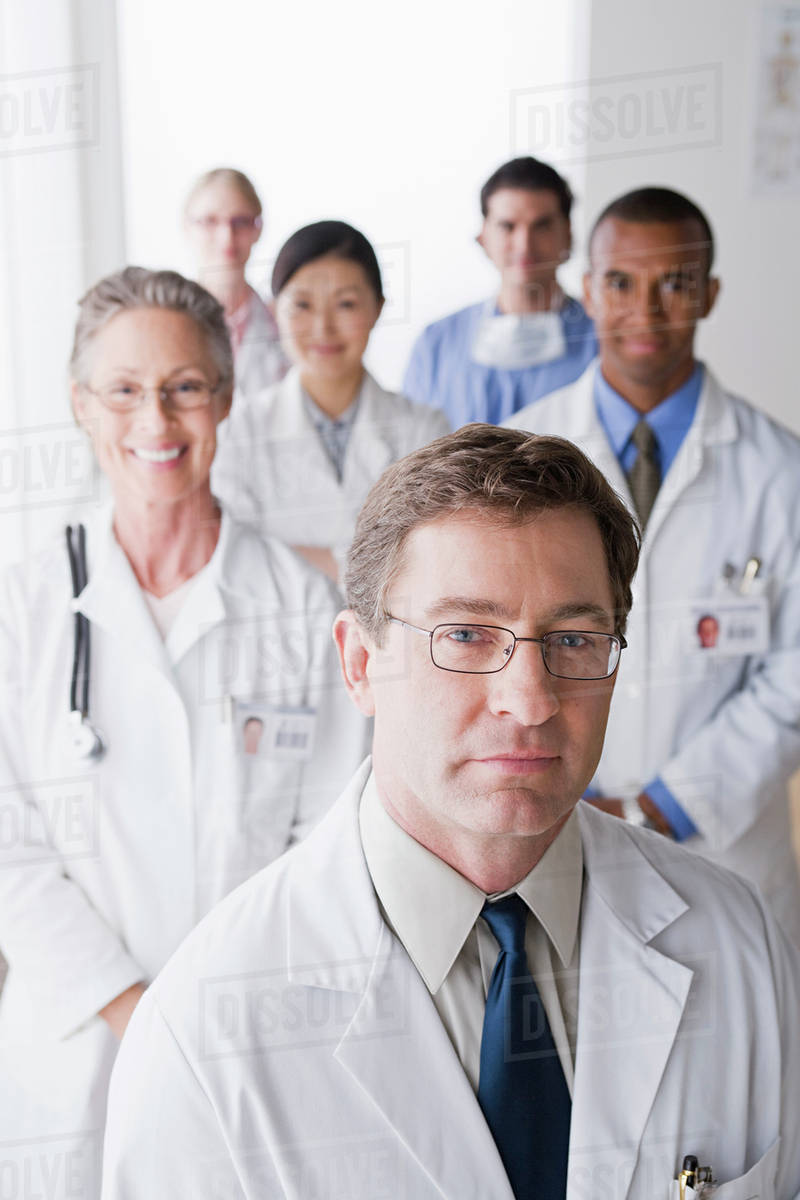 Group portrait of smiling doctors - Royalty-free Stock Photo | Dissolve