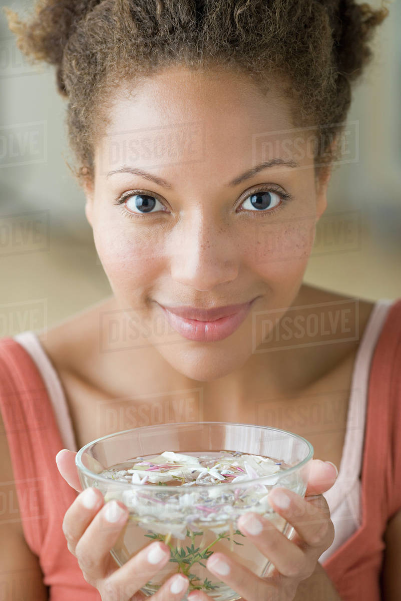 Woman enjoying aromatherapy - Stock Photo - Dissolve