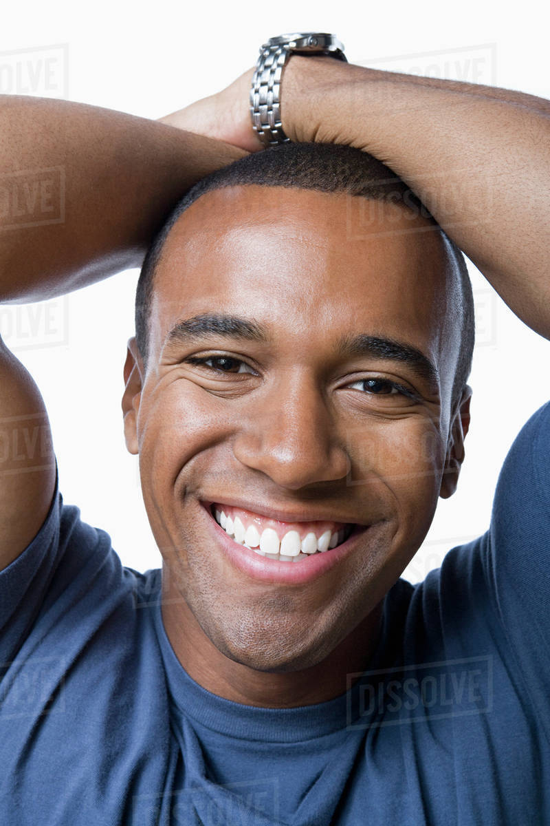 Studio portrait of young man - Royalty-free Stock Photo | Dissolve