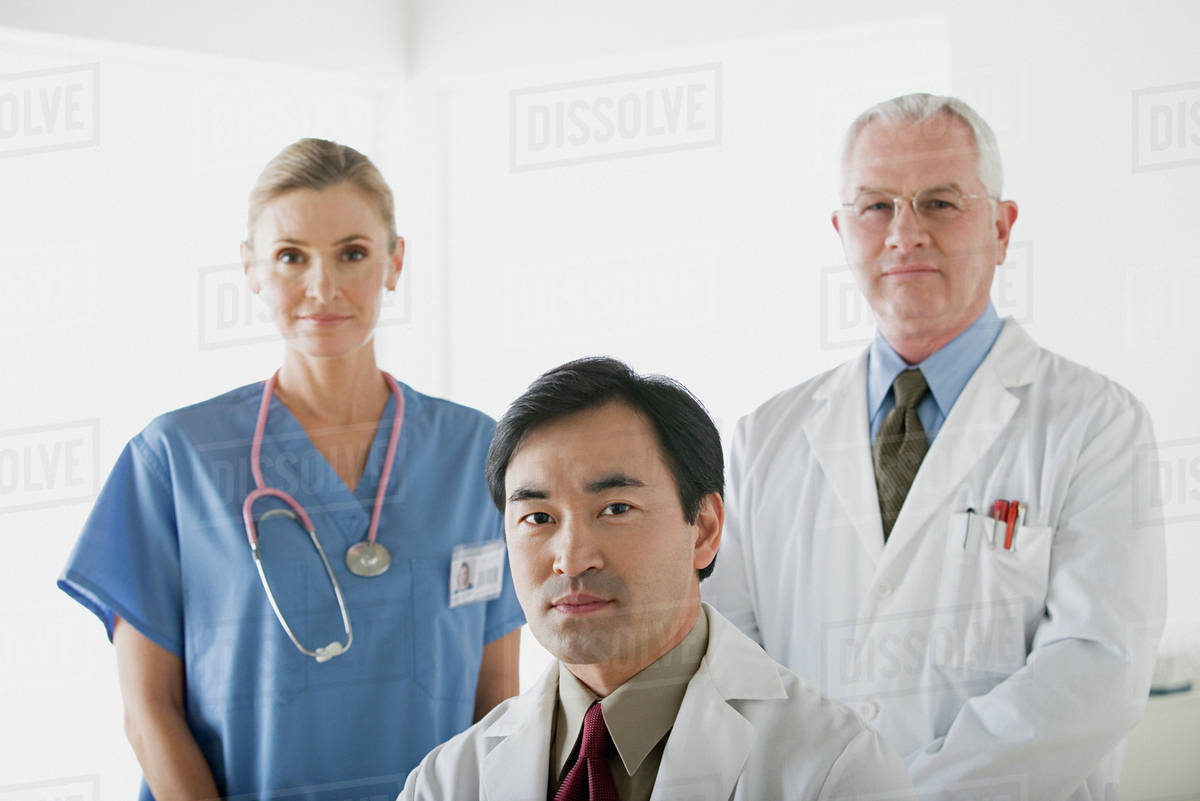 Portrait of three doctors - Stock Photo - Dissolve