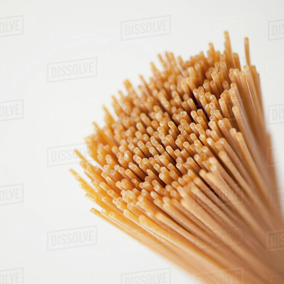 Bunch of dried spaghetti, close-up - Royalty-free Stock Photo | Dissolve
