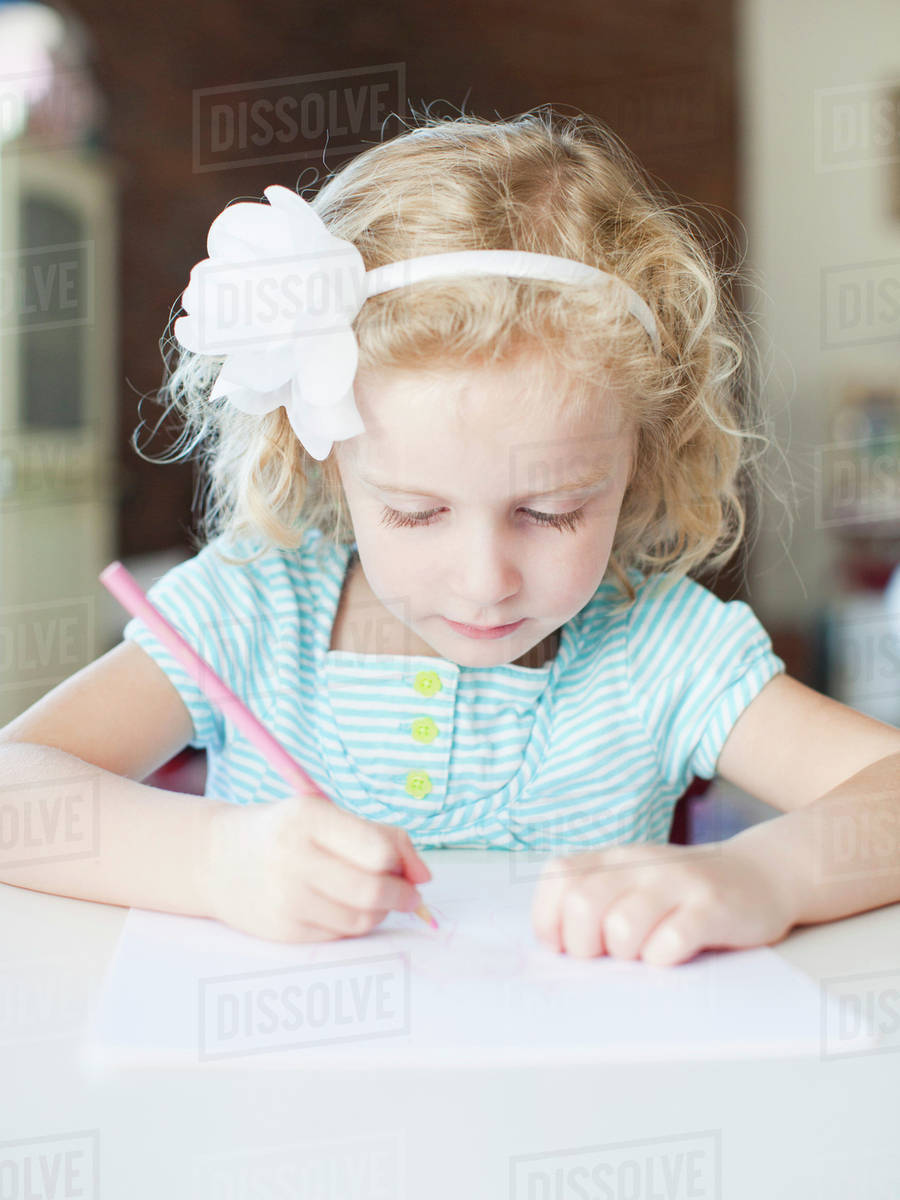 Girl drawing with colour pencil - Royalty-free Stock Photo | Dissolve