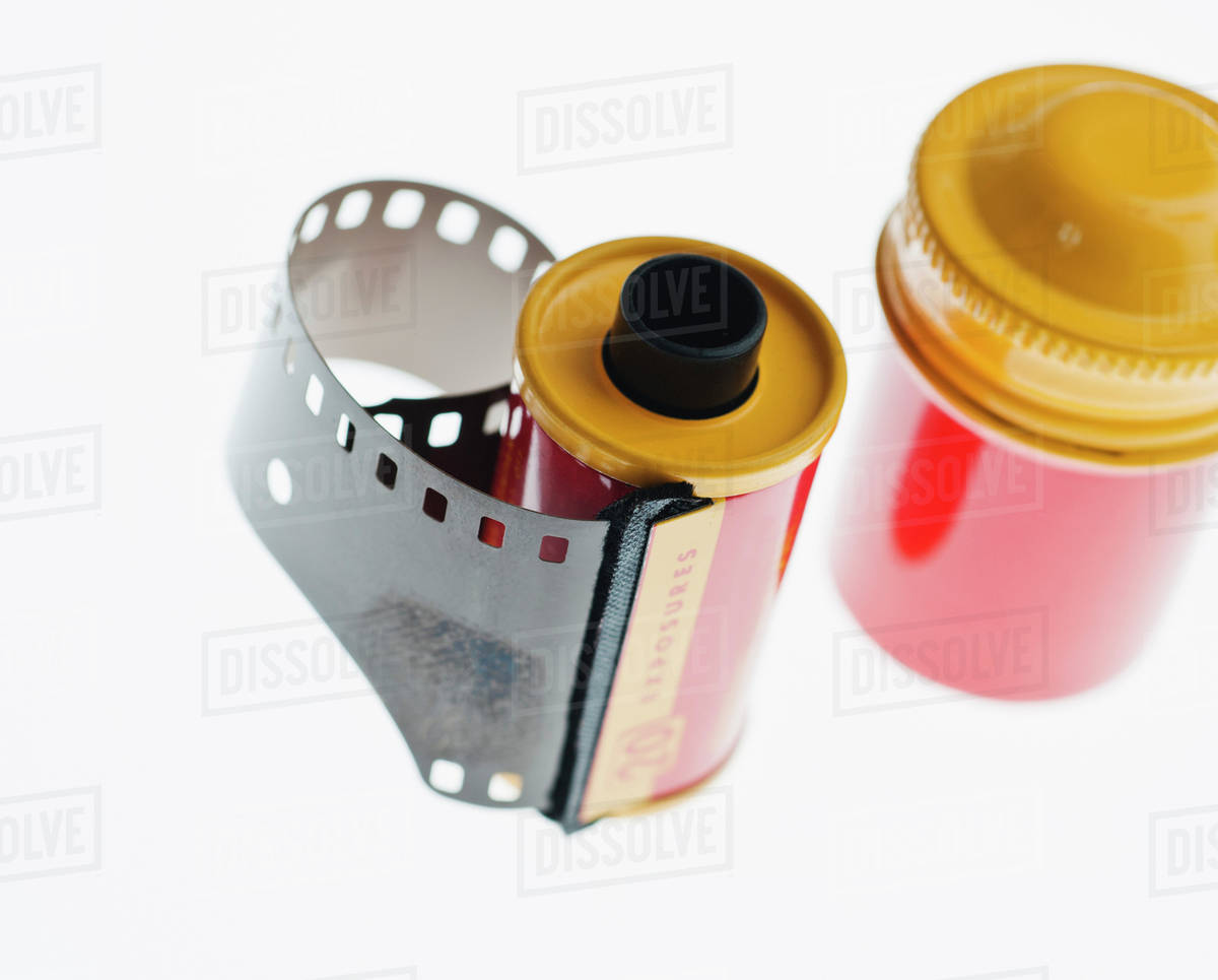 Close up of camera film and on light box - Stock Photo - Dissolve
