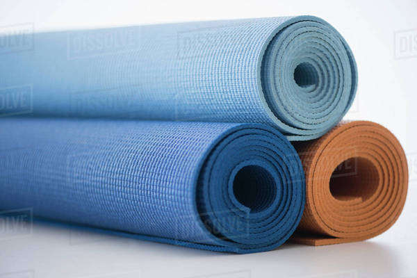 Studio Shot of rolled up exercise mats - Royalty-free Stock Photo ...