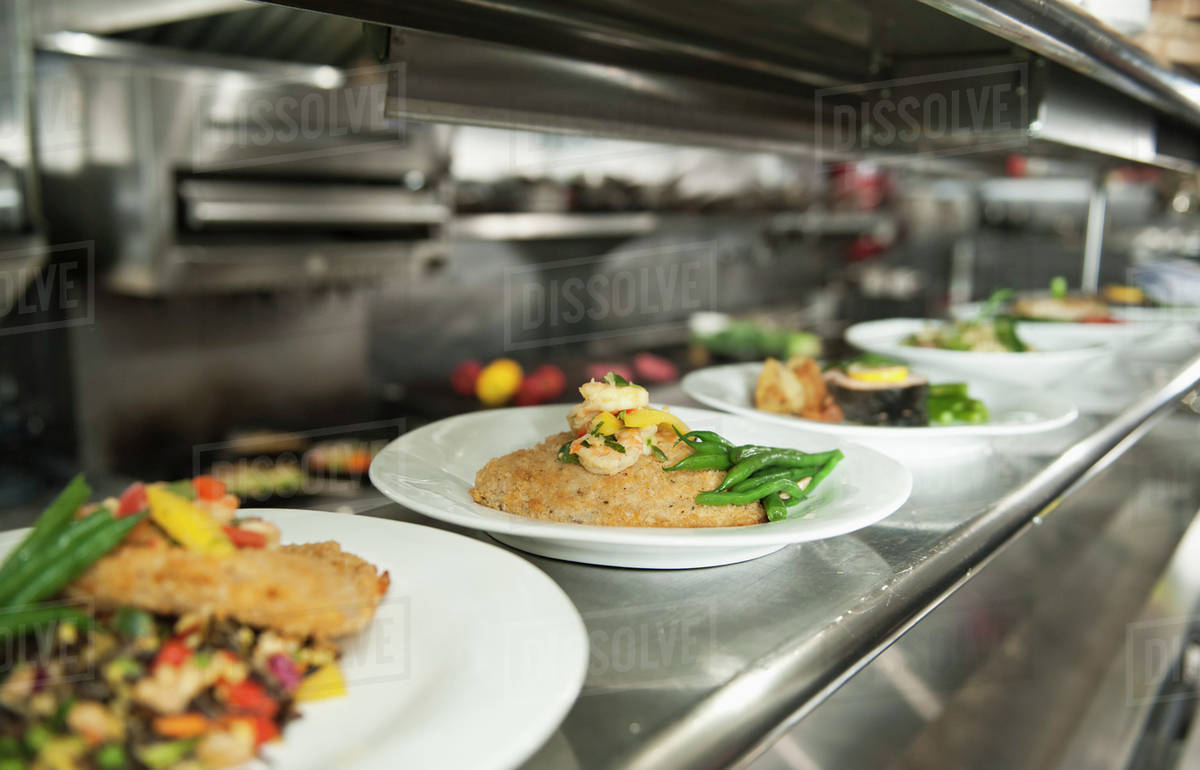 Food on plates in the kitchen - Royalty-free Stock Photo | Dissolve