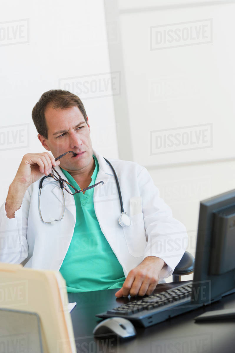 Doctor in office - Royalty-free Stock Photo | Dissolve