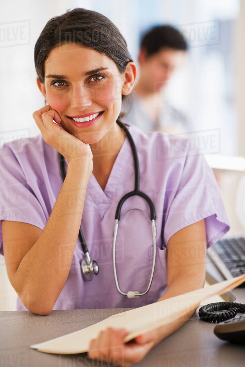 Portrait of female nurse - Stock Photo - Dissolve