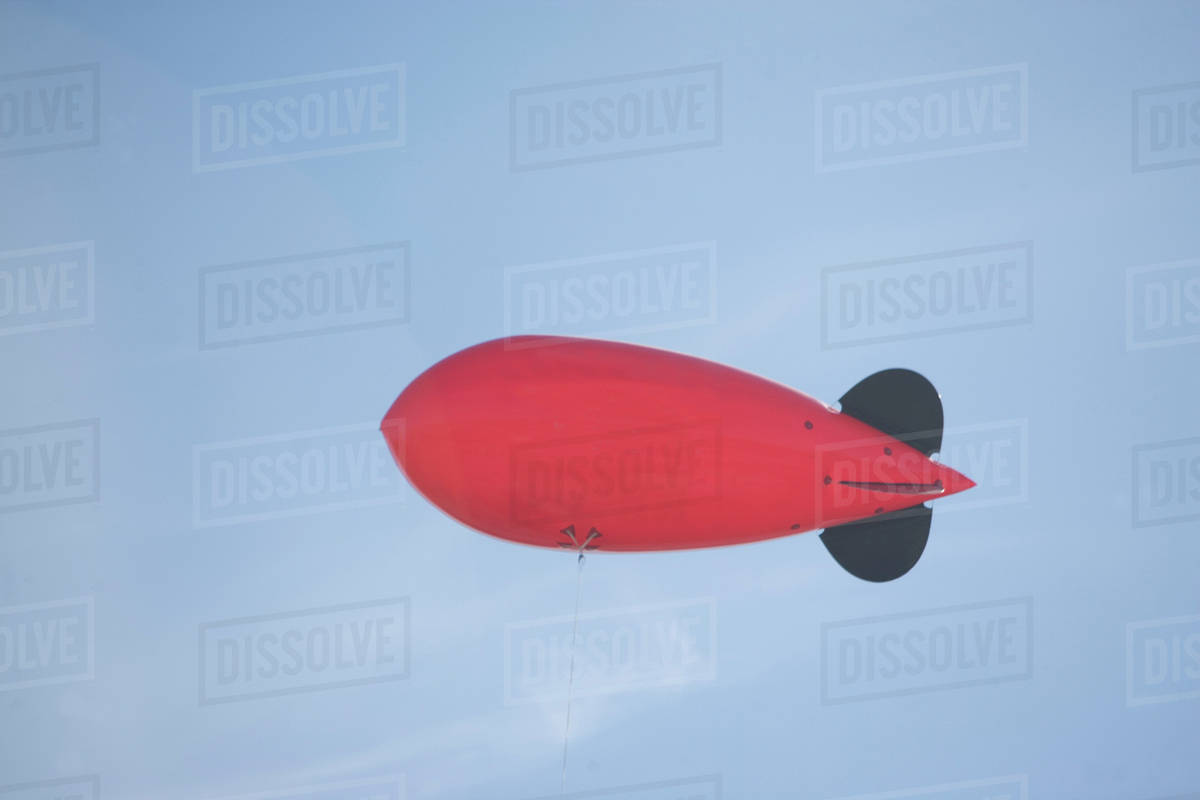 Flying advertising blimp - Royalty-free Stock Photo | Dissolve