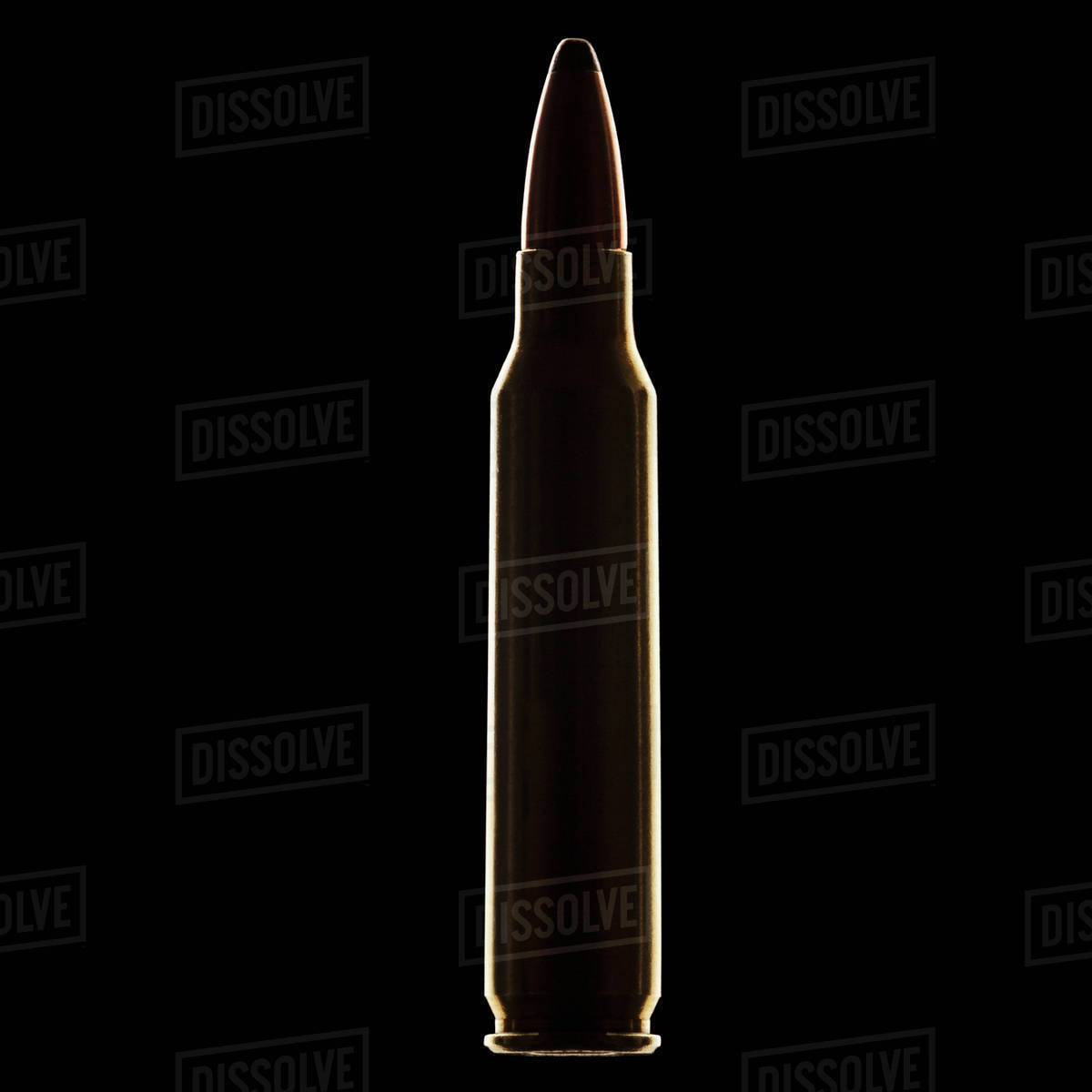 Single bullet on black background, close-up - Stock Photo - Dissolve