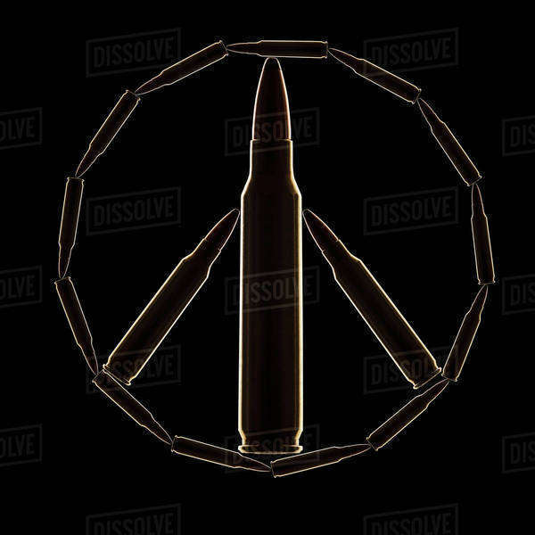 Peace Sign made of bullets on black background - Stock Photo - Dissolve