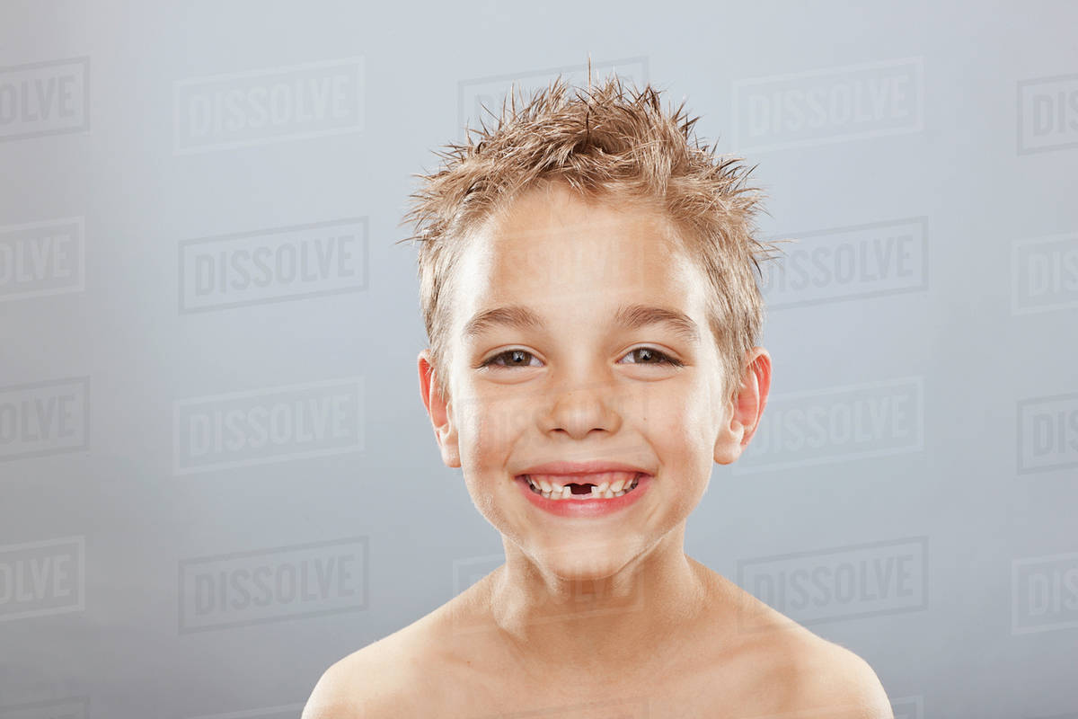 Studio portrait of toothless boy (8-9) smiling - Royalty-free Stock ...