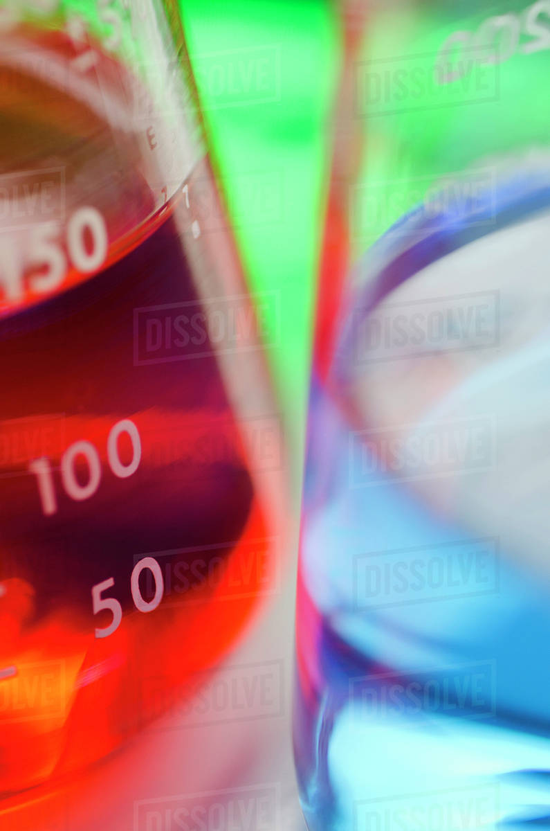 Studio shot of laboratory beakers - Stock Photo - Dissolve