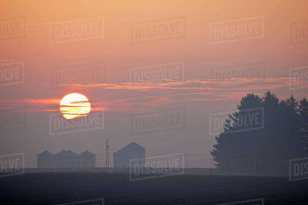 USA, Illinois, Springfield, Farm at sunrise - Stock Photo - Dissolve