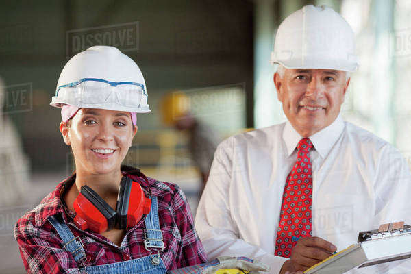 Portrait of manual worker and manager - Royalty-free Stock Photo | Dissolve