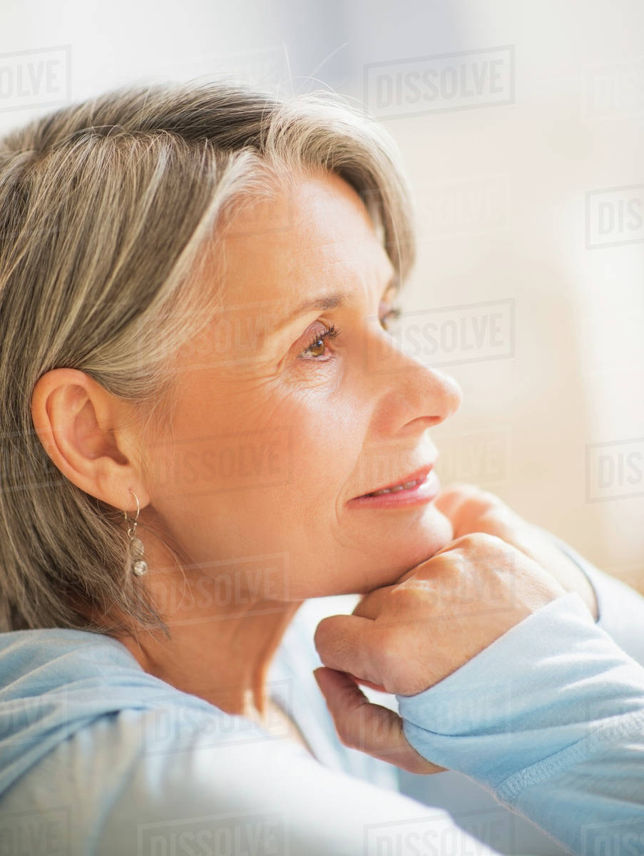Portrait of pensive woman - Stock Photo - Dissolve