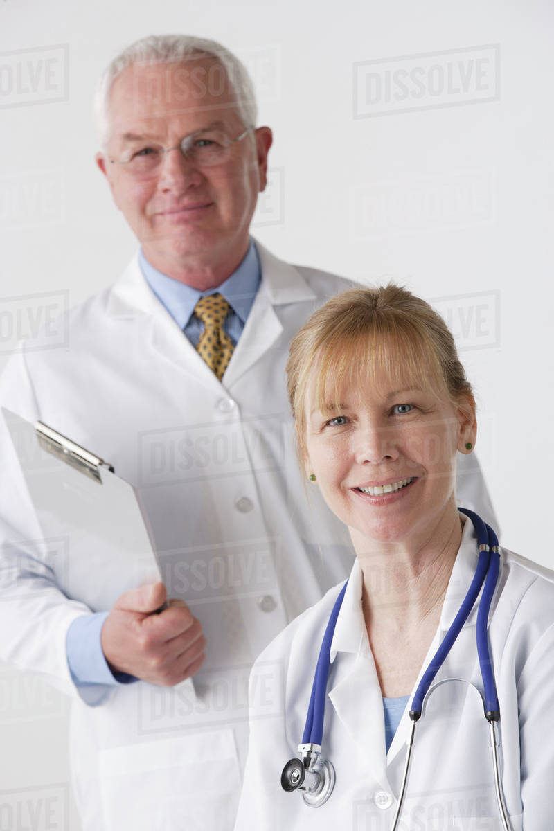Portrait of female and male doctor, studio shot - Royalty-free Stock ...