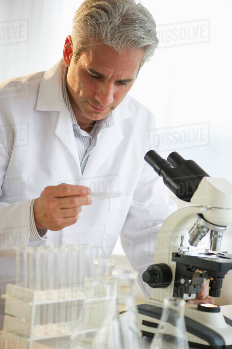 Researcher working in science lab - Royalty-free Stock Photo | Dissolve