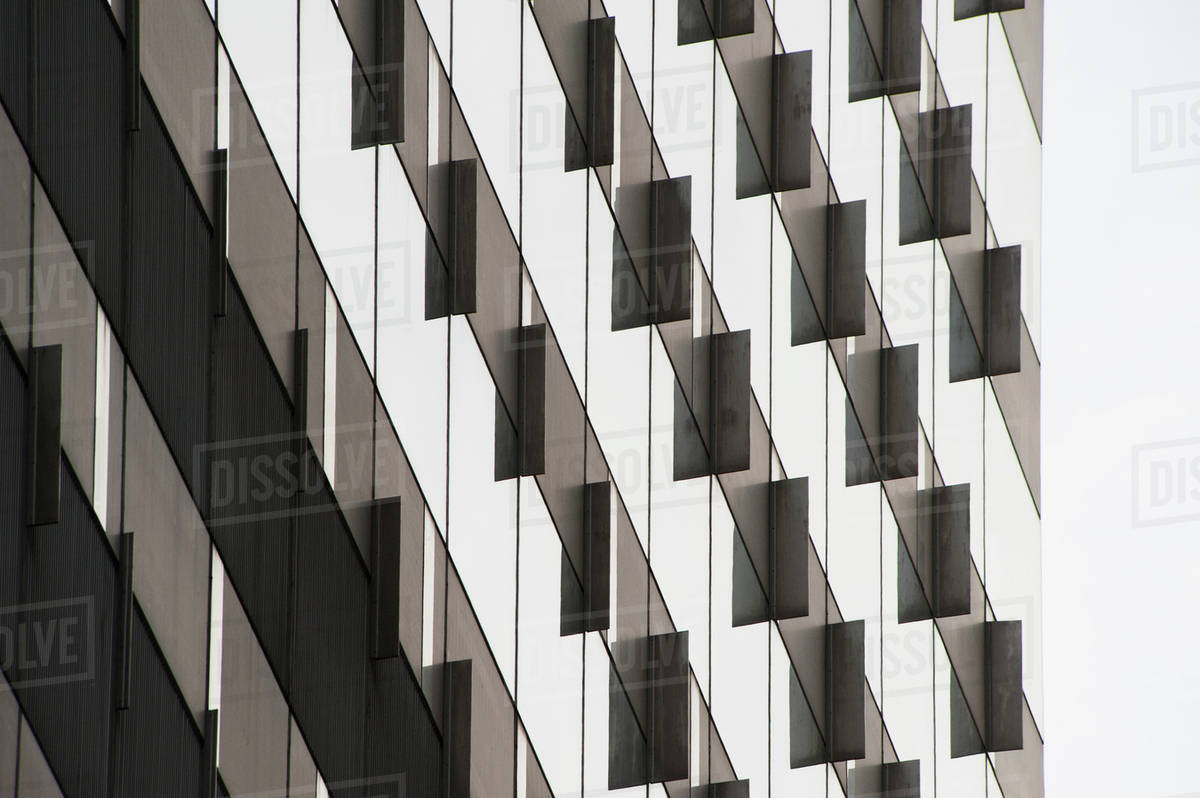 Windows on high-rise building - Stock Photo - Dissolve