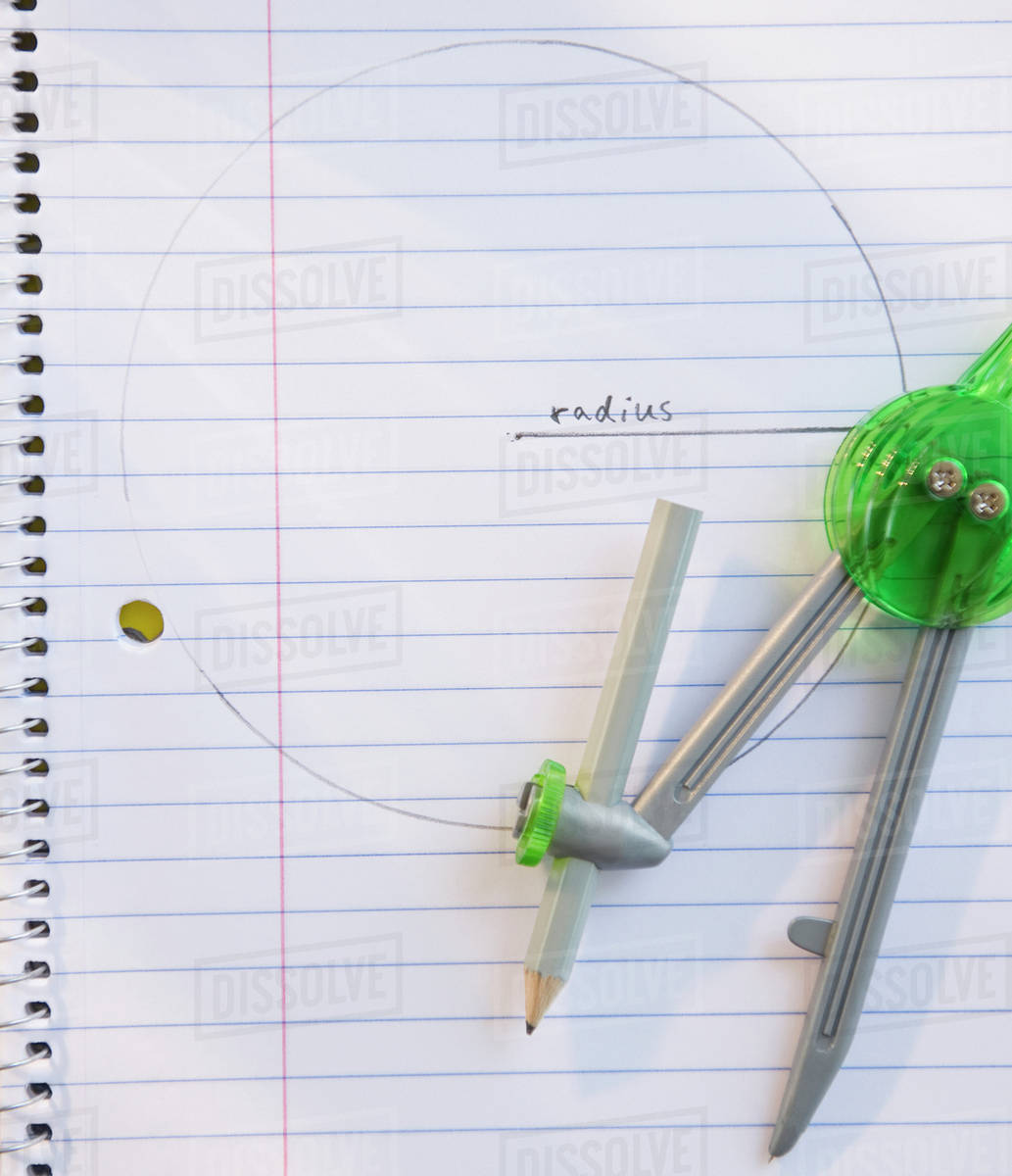 Drawing compass on notebook - Royalty-free Stock Photo | Dissolve