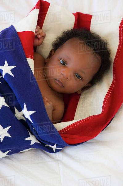 Baby wrapped in American flag - Royalty-free Stock Photo | Dissolve
