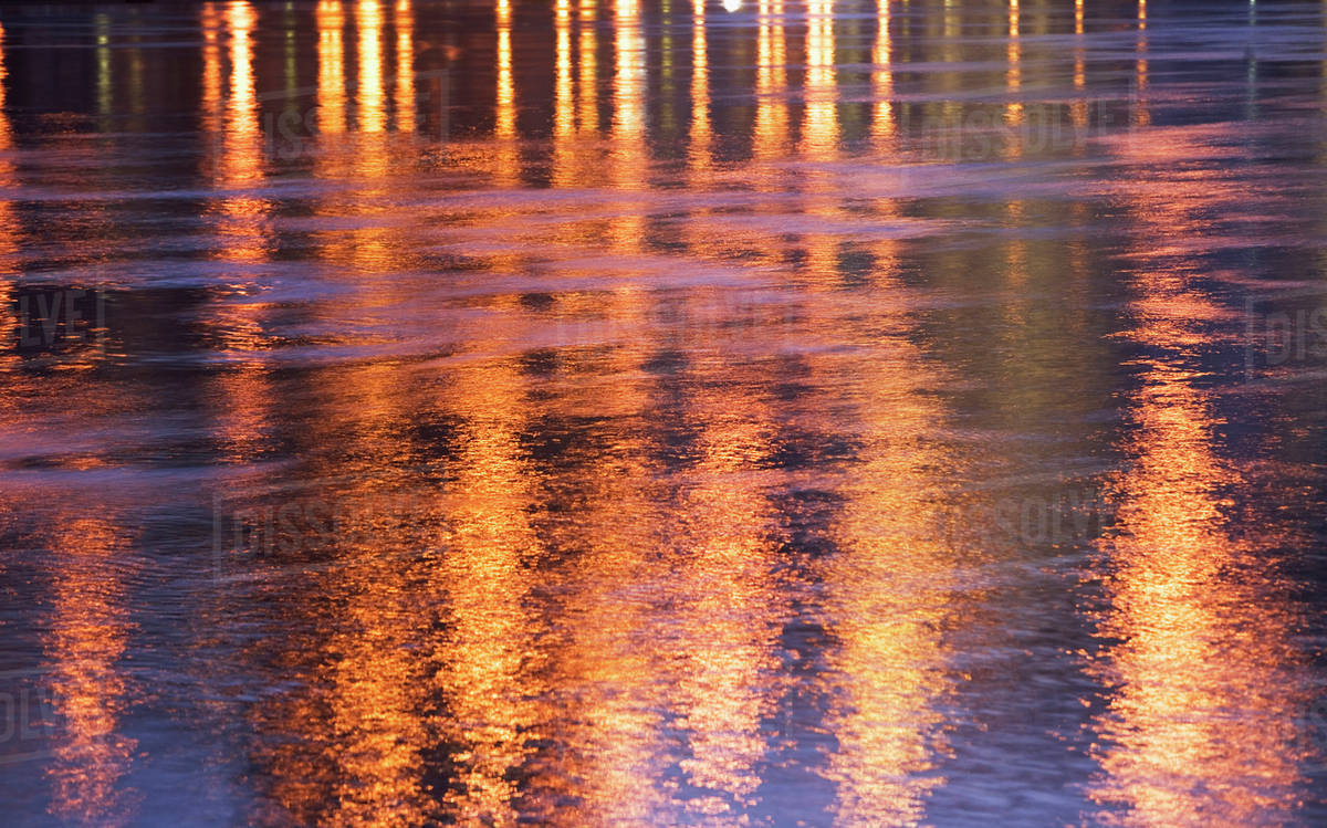 USA, New York State, New York City, City light reflecting in water ...
