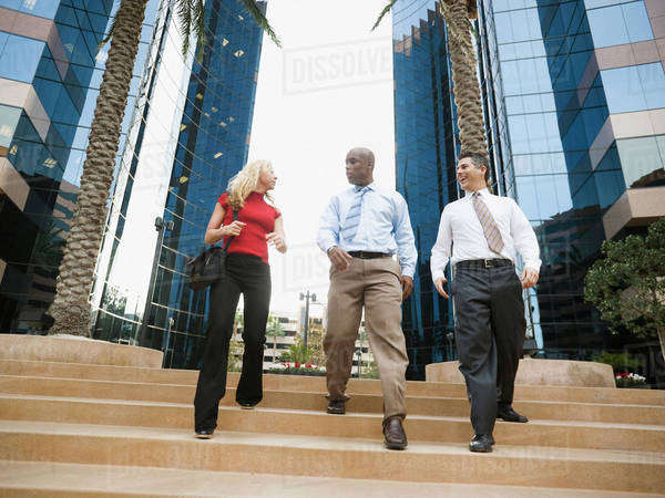 Business people leaving work - Royalty-free Stock Photo | Dissolve