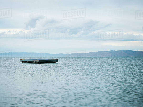 Raft floating on water - Stock Photo - Dissolve