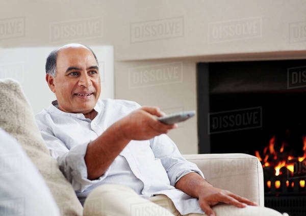 Man watching television - Royalty-free Stock Photo | Dissolve
