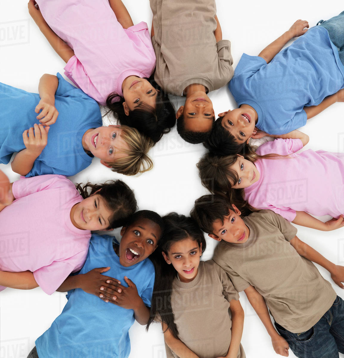 Children lying in a circle - Royalty-free Stock Photo | Dissolve