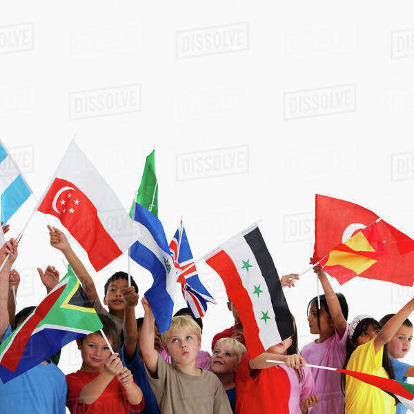 Children waving flags - Royalty-free Stock Photo | Dissolve